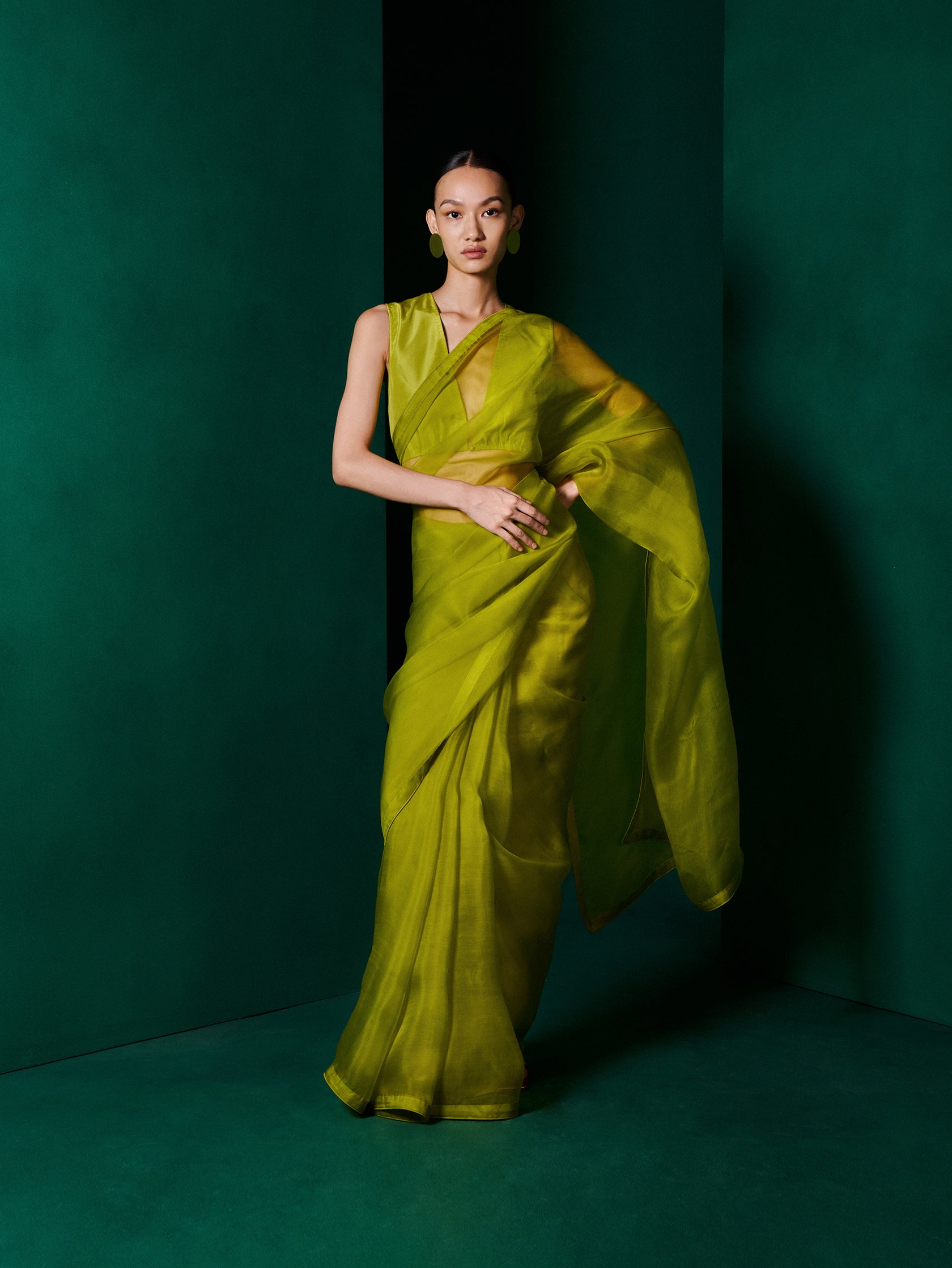 Ananya Pandey In Handwoven Moss Green Organza Saree